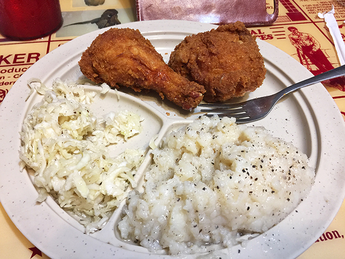 Cole slaw and potato salad that would make your grandmother nod in approval&mdash;simple, perfect companions to that famous chicken.
