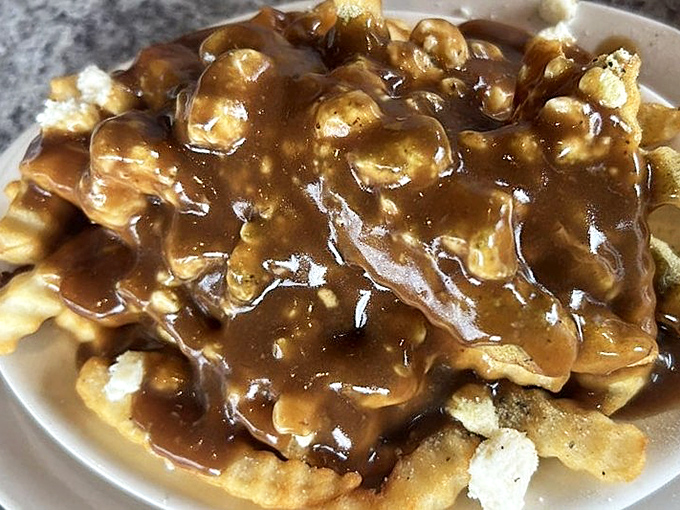 Gravy-smothered fries that don't just speak to your soul&mdash;they sing a full opera of comfort food classics with every delicious, messy bite.