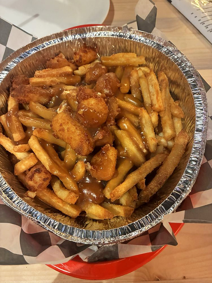 Poutine fries that could make a Canadian shed a patriotic tear. Crispy fries, savory chicken, and gravy creating a harmony that puts boy bands to shame.