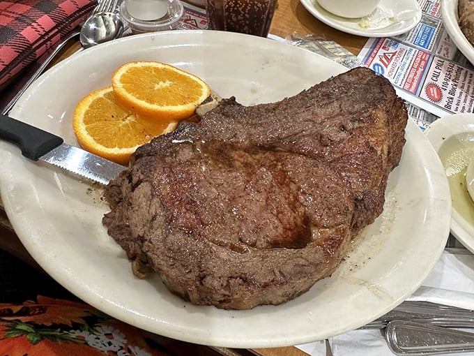 A prime rib that makes you question every other steak you've ever met. Those orange slices aren't just garnish&mdash;they're a palate-cleansing intermission.