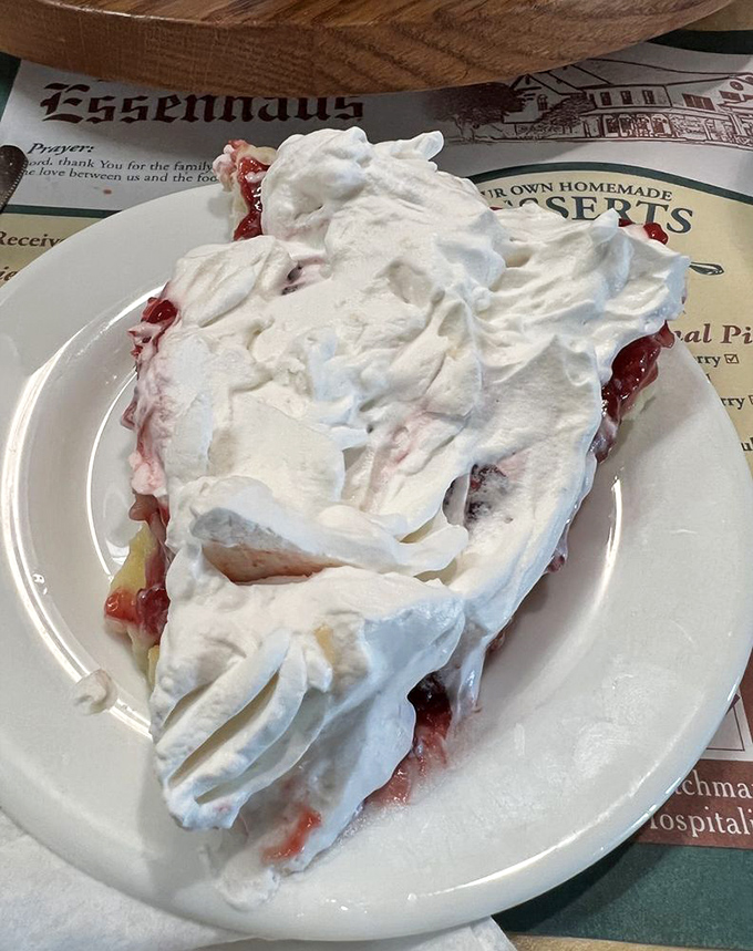 Cream pie with peaks of meringue so high they should require their own zip code, crowned with fresh berries.