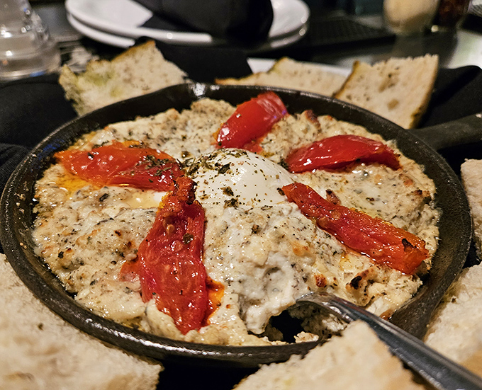 This skillet of bubbling cheese and roasted tomatoes doesn't just arrive at your table&mdash;it makes an entrance.