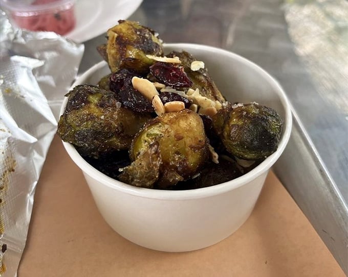 Brussels sprouts that have been transformed from childhood nightmare to adult craving, with cranberries and almonds playing supporting roles.