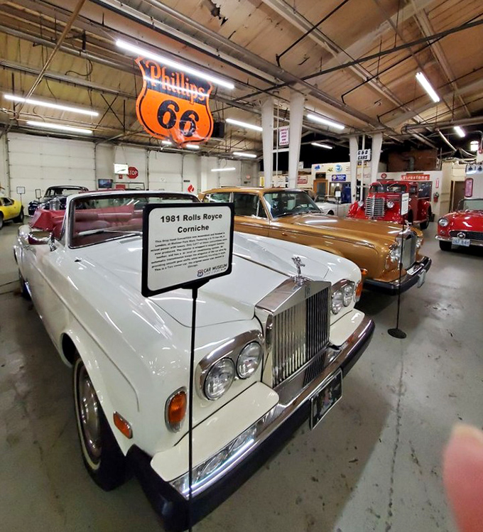 White elegance meets golden luxury in this Rolls-Royce display. Even James Bond would pause to admire these British masterpieces.
