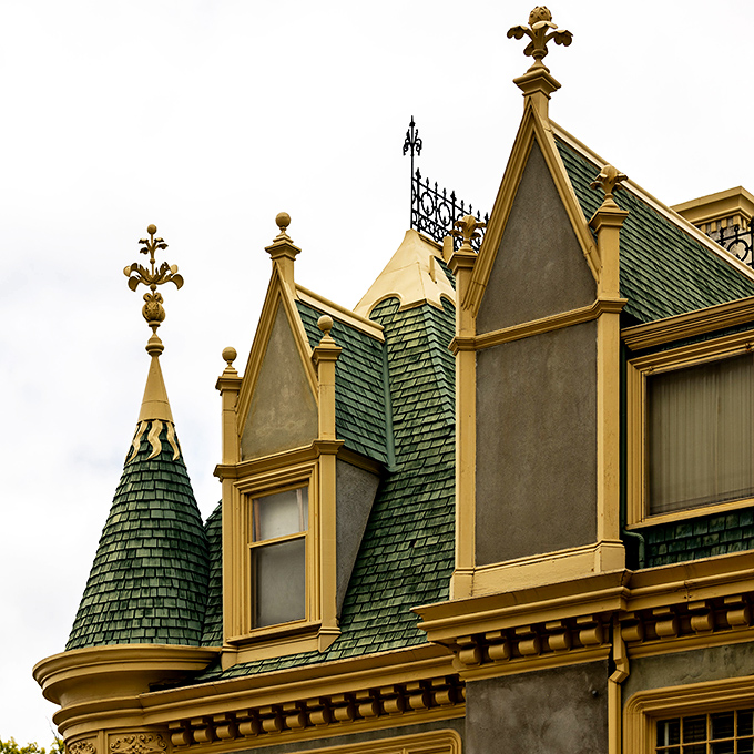 Rooftop drama at its finest. Those green turrets and golden trim would make any medieval castle jealous of California style.