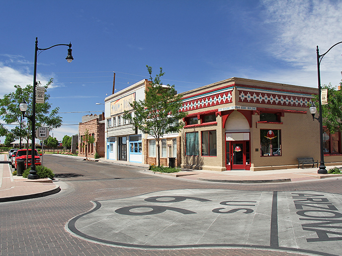 The famous Route 66 corner immortalized by the Eagles draws visitors who find unexpected affordability alongside musical nostalgia.