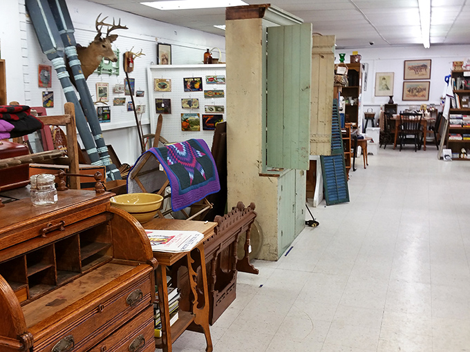Rustic charm meets practical storage in this hallway of history&mdash;where vintage shutters and quality furniture await their next chapter.