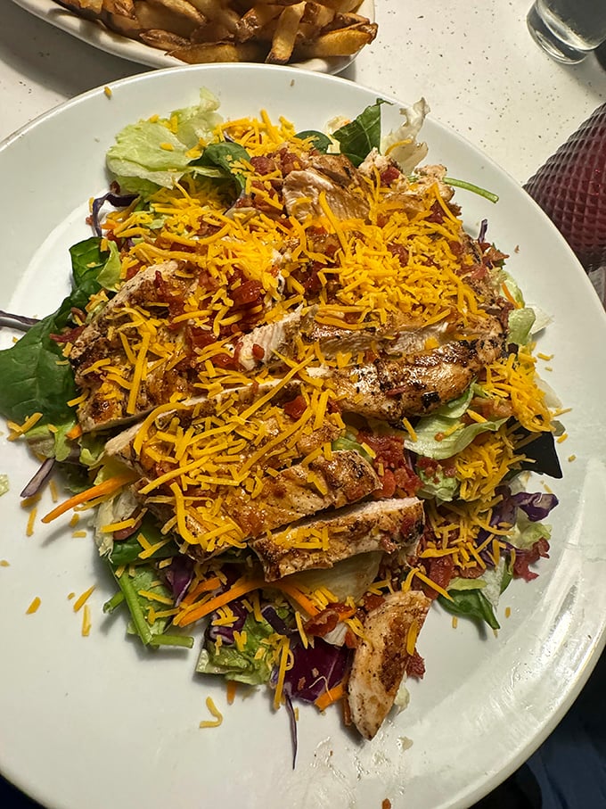 Fresh greens get the star treatment here, proving salads can share the spotlight with steak.