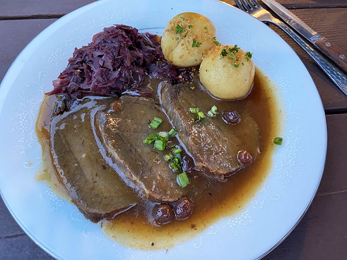 Sauerbraten with red cabbage and potato dumplings&mdash;proof that German comfort food works perfectly in Florida's tropical climate.