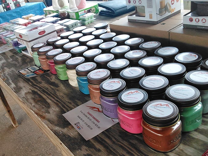 Mason jar candles in every hue imaginable—like a fragrant rainbow that promises to make your home smell like someone's actually been cleaning.