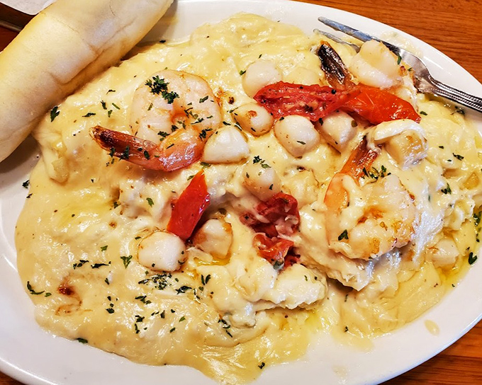 Seafood manicotti swimming in creamy sauce with plump shrimp&mdash;proof that inland Pennsylvania can absolutely nail seafood when it wants to.