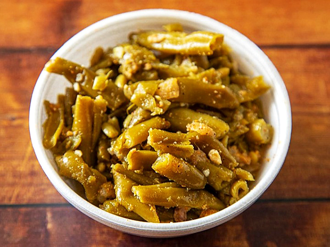 Green beans seasoned with enough soul to make you forget they're technically a vegetable. Southern comfort in every bite.