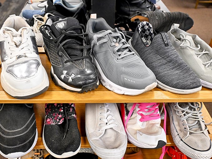 Athletic footwear lined up like hopeful contestants, each pair with plenty of miles left for your next adventure.