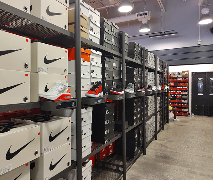 Sneakerhead nirvana! Nike's backstock wall resembles a museum of athletic achievement, with each box containing potential personal records.
