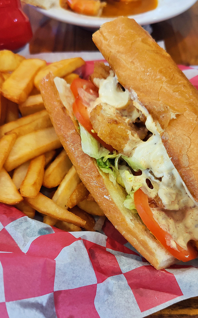 The po-boy sandwich&mdash;where crispy fried seafood meets soft bread in a marriage so perfect it should have its own reality show.