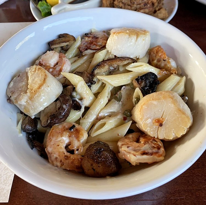 When shrimp, scallops, and pasta get together like this, it's basically a seafood party and everyone's invited to the celebration.