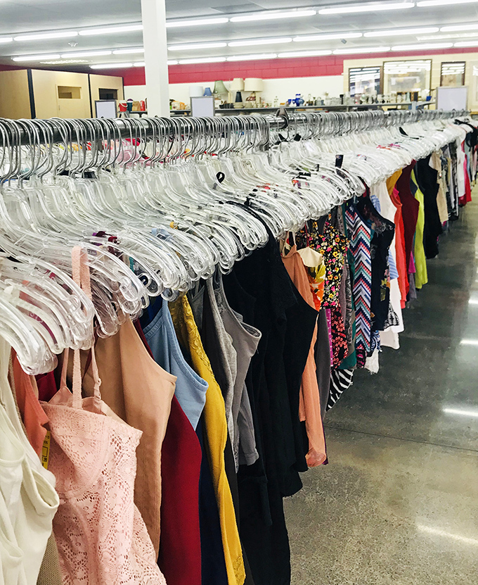 Where bargain hunters and fashion lovers meet: racks of women’s clothes ready for a new closet to call home.