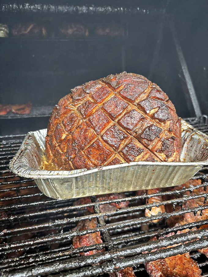 That cross-hatched beauty is what happens when ham meets smoke and fire &ndash; a glistening masterpiece that would make even vegetarians pause for a moment of respect.