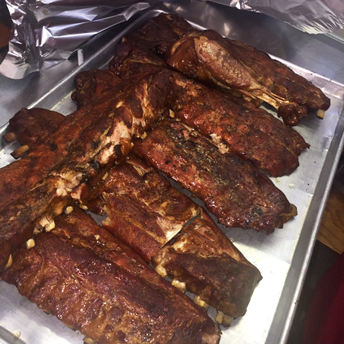 These ribs have clearly been on a slow, smoky journey to perfection. The destination? Your very happy taste buds.
