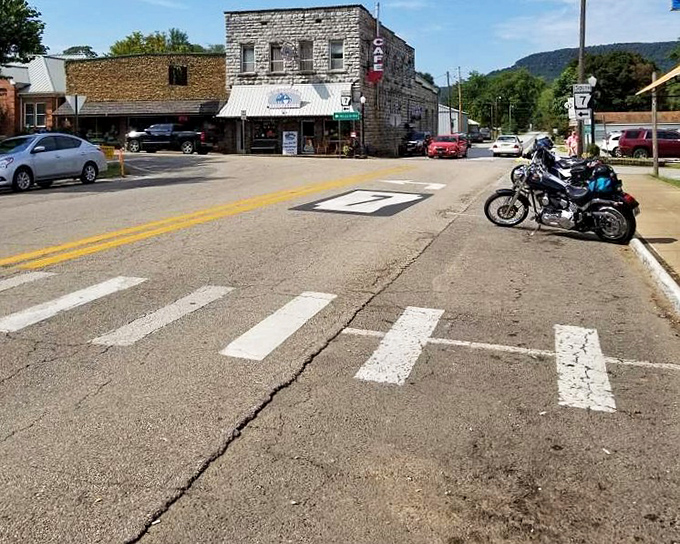 Stone buildings line Main Street with architectural character that modern construction just can't fake, no matter how hard it tries.