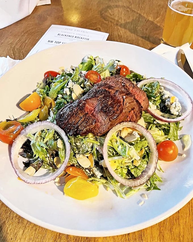The PT Steak Salad proves that "eating light" and "indulgence" aren't mutually exclusive concepts&mdash;especially with those perfect grill marks.