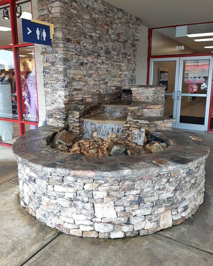 This stone fountain offers a moment of zen contemplation&mdash;or just a place to rest while deciding which store deserves your attention next.