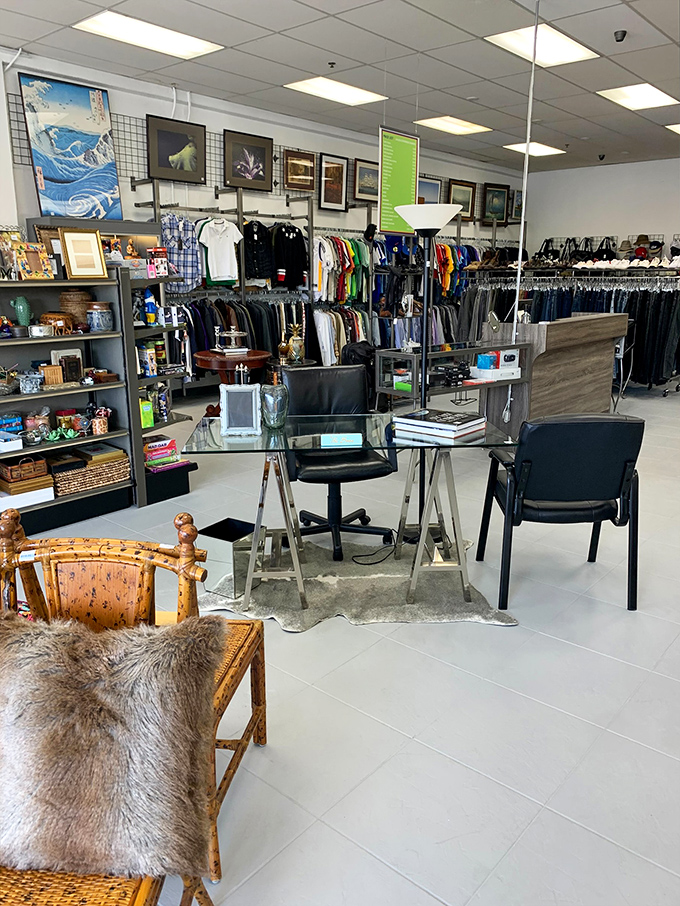Modern meets vintage in this carefully arranged furniture vignette. That glass desk wouldn't look out of place in a design magazine spread.