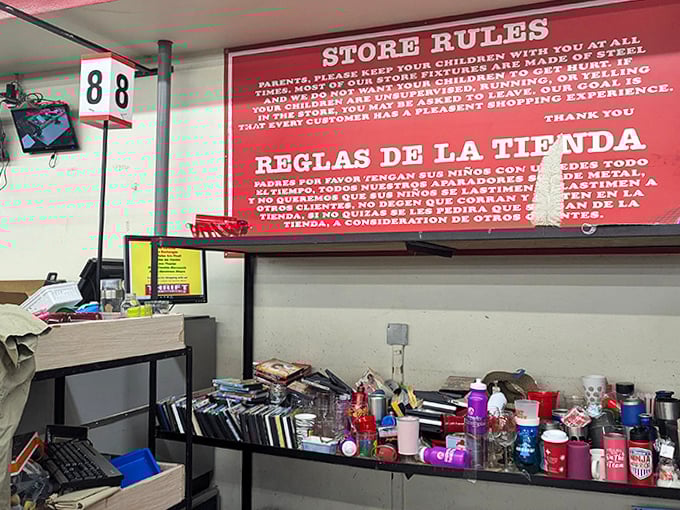 The store rules stand sentinel above a collection of miscellaneous treasures&mdash;bilingual instructions for a universal thrifting experience.