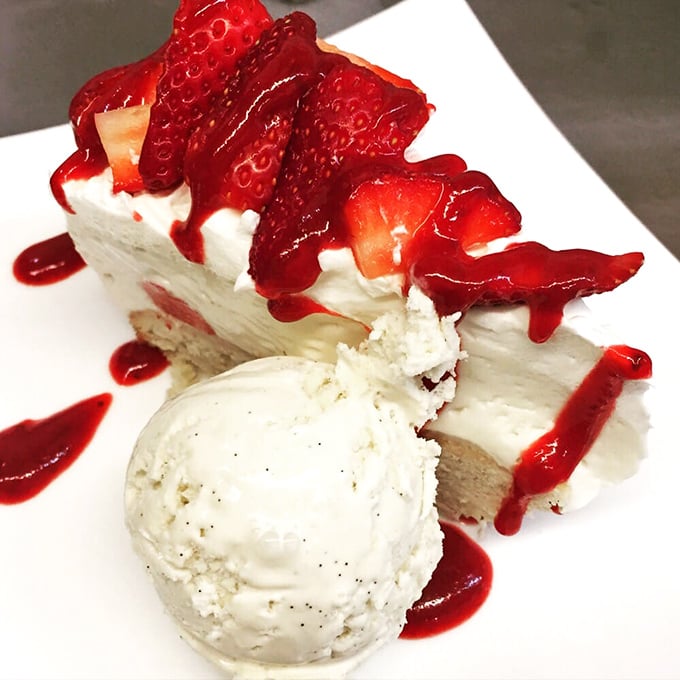 Strawberry shortcake cheesecake that doesn't just satisfy your sweet tooth&mdash;it throws a party for it, complete with fresh berries and a scoop of vanilla ice cream.