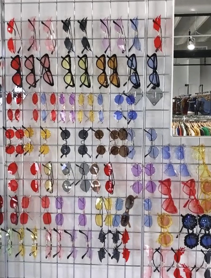 Sunglasses displayed like a rainbow of possibilities, because squinting is so last season and variety is everything.