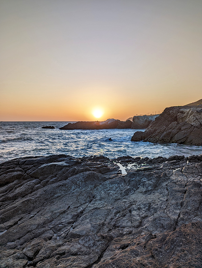 Sunset alchemy: when ordinary rocks transform into gold-dipped sculptures and the Pacific becomes liquid amber. Nature's happy hour special.