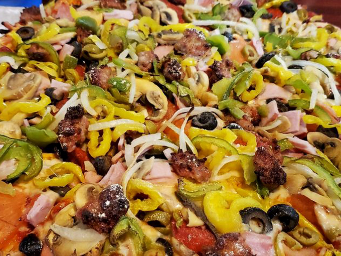 The Supreme pizza lives up to its judicial name, making fair and delicious rulings on proper topping distribution. A constitutional convention of flavors in perfect harmony.