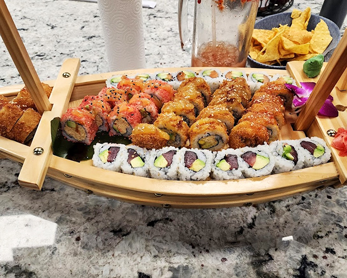 Sushi boat coming into dock! This vessel delivers Japanese-Mexican fusion that works surprisingly well, like peanut butter and chocolate's unexpected cousin.