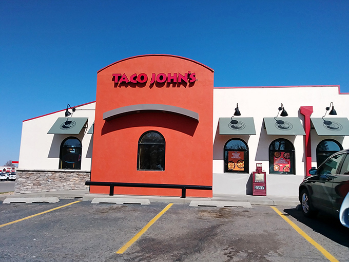 Taco John's stands as a colorful outpost of Tex-Mex flavors, where fast food meets western plains hospitality.