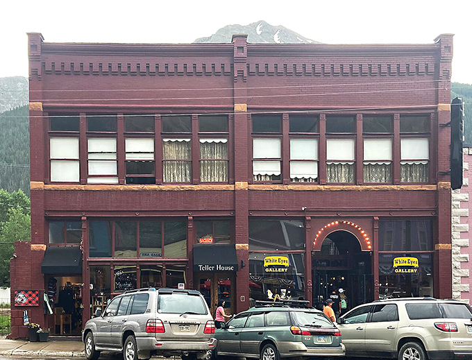 The Teller House stands proudly on Greene Street, its brick facade having witnessed more Colorado history than most state textbooks ever cover.