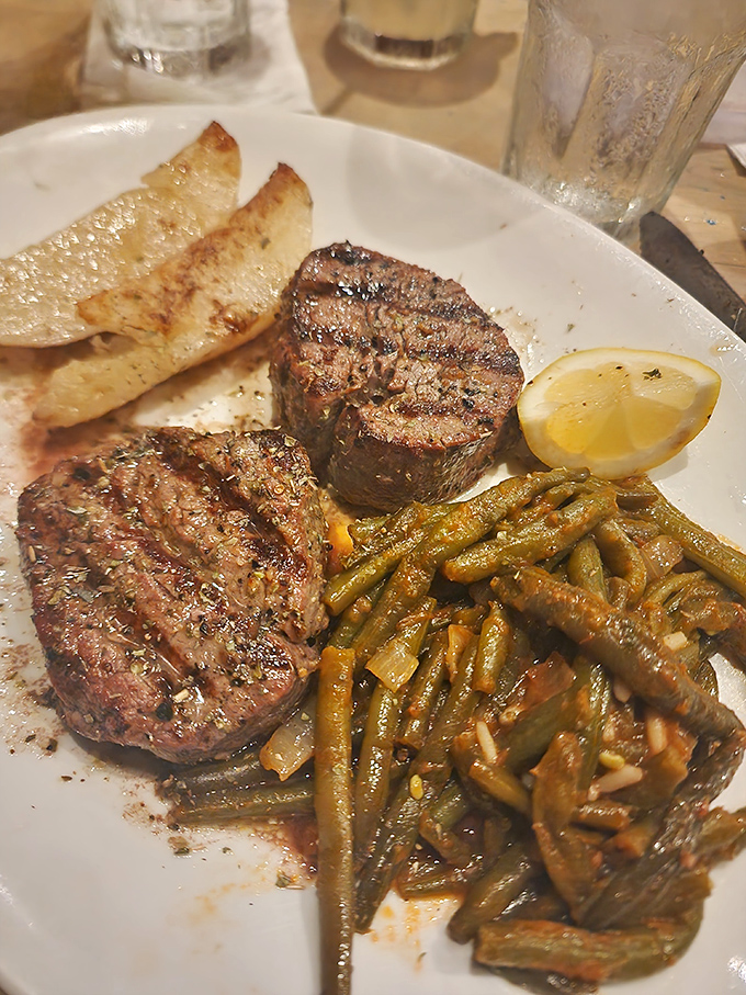 Tenderloin medallions with the perfect sear&mdash;proof that Greeks know their way around beef too. That char speaks of high heat and careful timing.