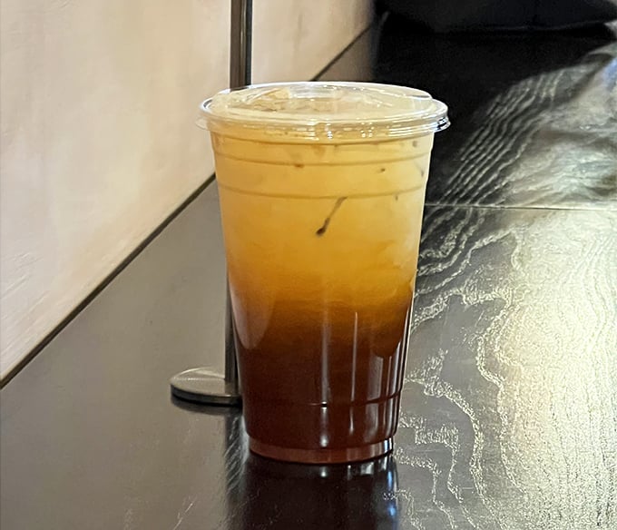 Thai tea &ndash; where creamy meets tangy in a two-toned glass of refreshment. The perfect companion when your taste buds need a vacation.