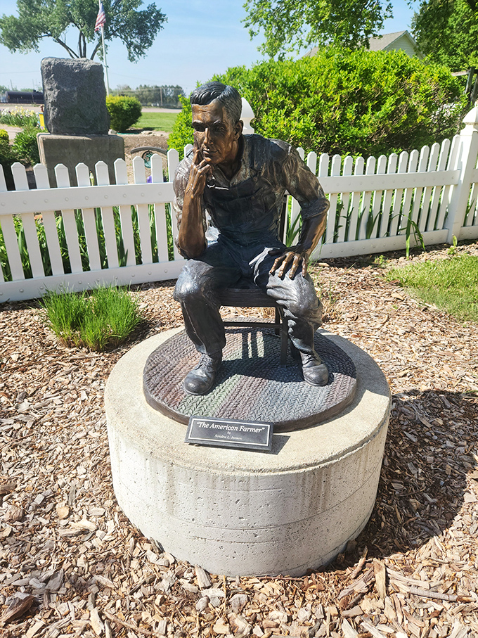 This contemplative farmer statue honors the agricultural backbone that built Nebraska and keeps communities thriving through generations.