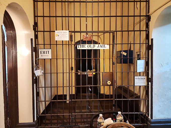 Welcome to The Old Jail—said no inmate ever. The entrance gate's imposing iron bars set the tone for what was definitely not a voluntary staycation.