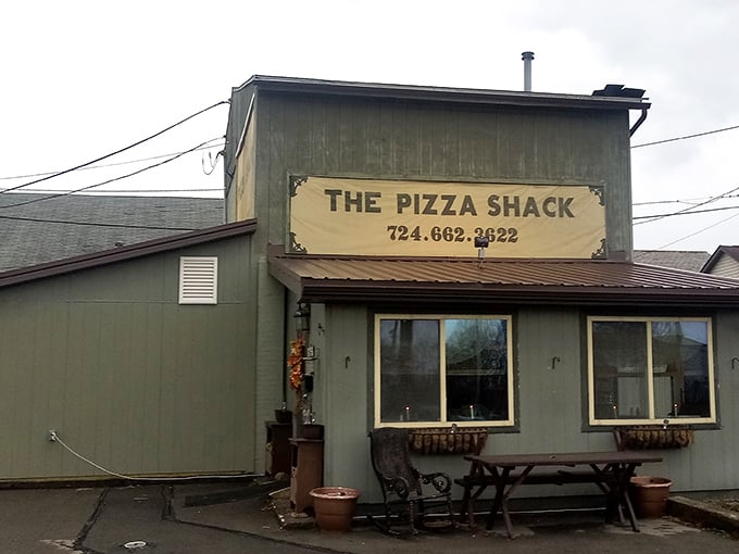 The Pizza Shack proves that unassuming exteriors often hide the best food treasures&mdash;no Instagram lighting required, just delicious pizza.