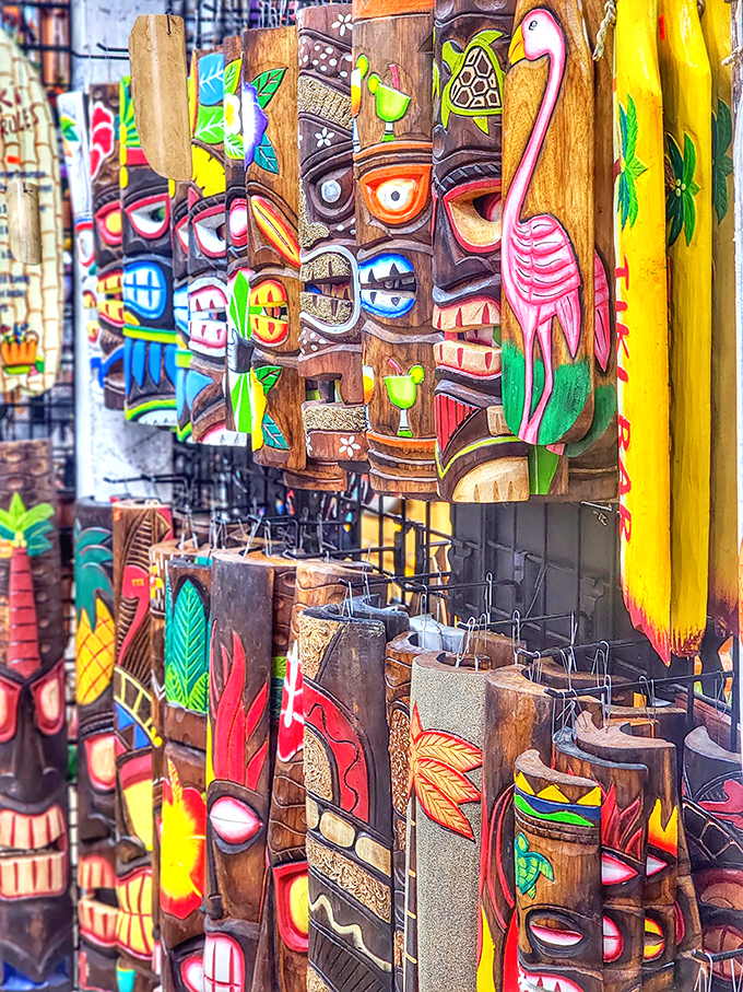 Tiki culture explosion! These wooden masks and tropical carvings bring instant vacation vibes to any space &ndash; flamingo included, naturally.