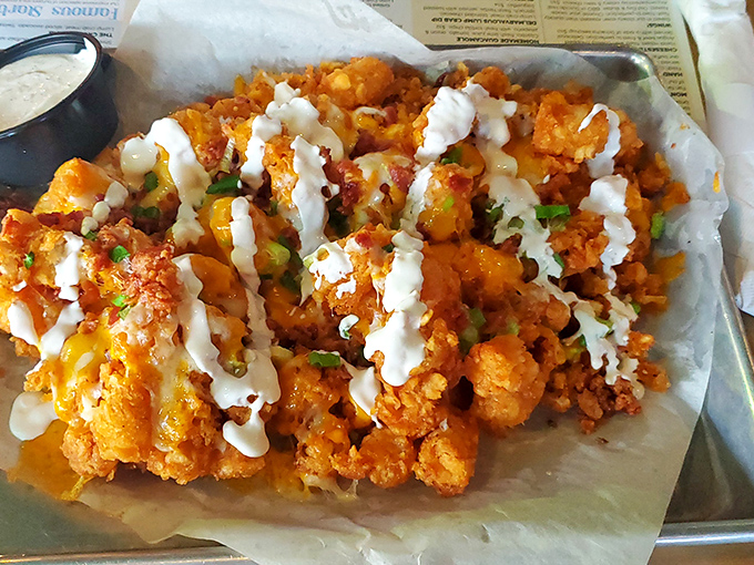 These Buffalo-style tots arrive dressed to impress, proving potatoes can party just as hard as their nacho cousins.