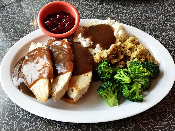 Thanksgiving doesn't have to wait for November when turkey dinner with all the trimmings is served with this much care and generosity.