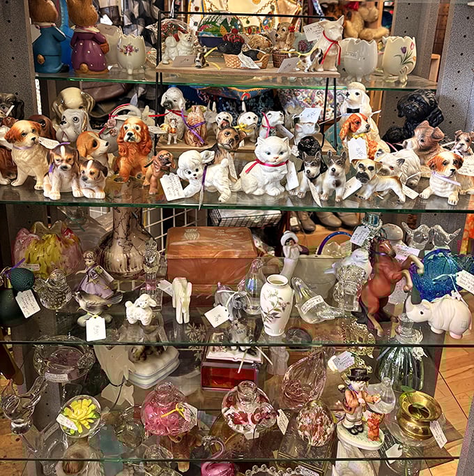 The figurine collection that proves our grandparents never met a ceramic animal they didn't want to adopt. The dog brigade stands at attention.