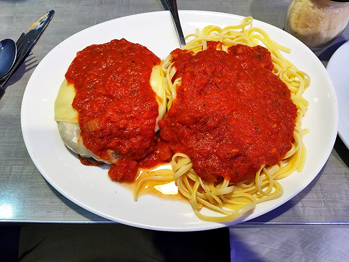 Veal parmesan that's having an identity crisis as a swimming pool &ndash; those generous portions of sauce could qualify as a small lake.