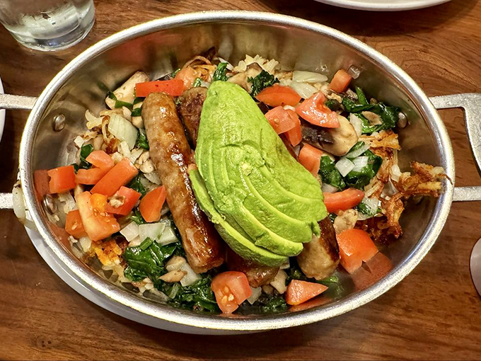This skillet doesn't just contain breakfast&mdash;it's hosting a vegetable convention with avocado as the keynote speaker.