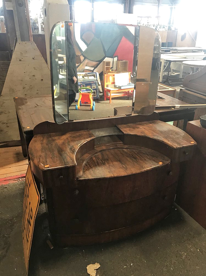 This Art Deco vanity has witnessed countless morning routines and evening preparations. Its mirror still ready to reflect new faces and fresh stories.