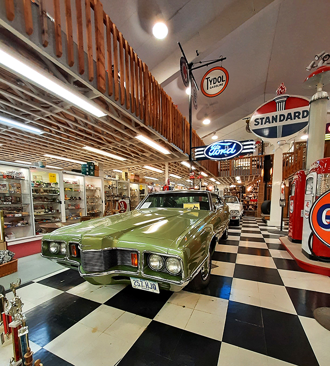Detroit's finest parked indoors where it belongs. This mint-green beauty shares space with the gas pumps that once kept it running.