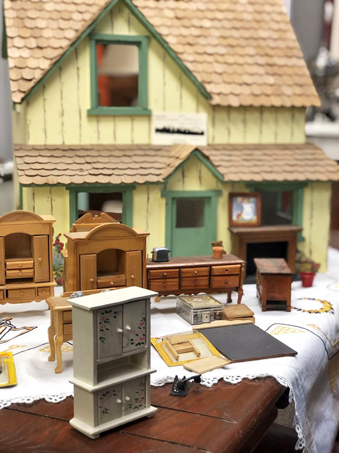 Dollhouse furniture arranged with such care you'll want to shrink yourself down and move right in.