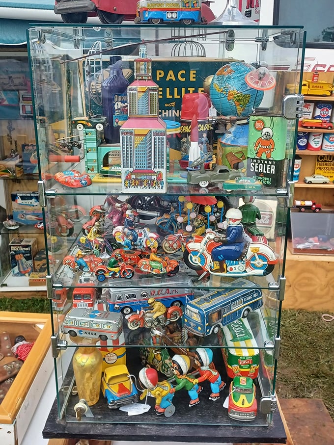 Tiny treasures with massive nostalgic appeal. This display case of vintage tin toys represents childhood joy for multiple generations.
